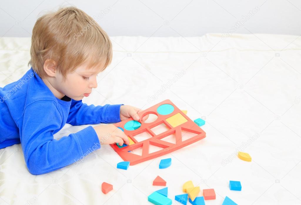 Little boy learning shapes Stock Photo by ©Nadezhda1906 96081034