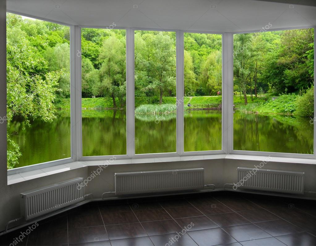 Modern window of veranda overlooking the river Stock Photo by ...