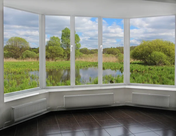 Window overlooking the summer field and country road — Stock Photo ...