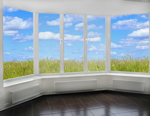 Window overlooking the summer field and country road — Stock Photo ...