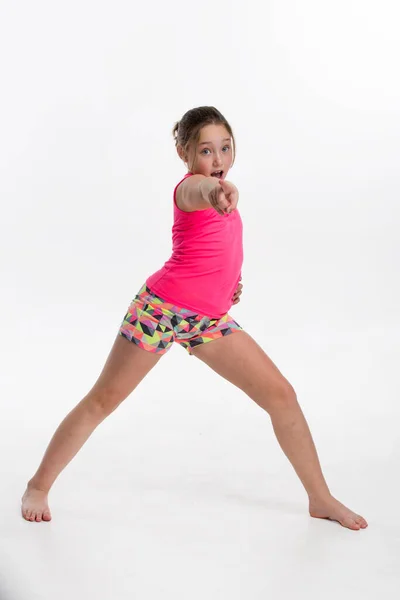 Young Tween Girl Streching Dance Routine Stock Photo by ©danienel 482083866