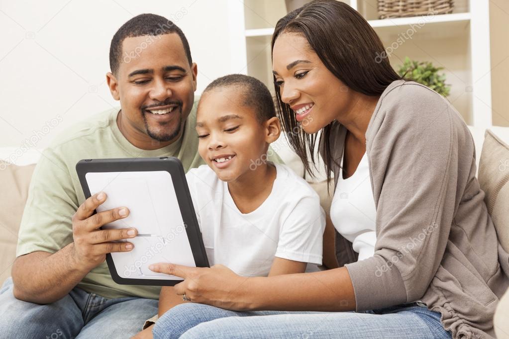 Family using tablet computer together — Stock Photo © dmbaker #58621207