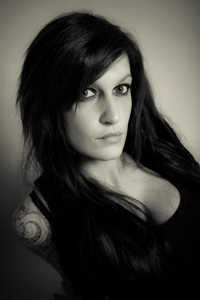 Tattooed sensual woman — Stock Photo © leporiniumberto #83564364 Tattooed sensual woman — Stock Photo © leporiniumberto #83564364