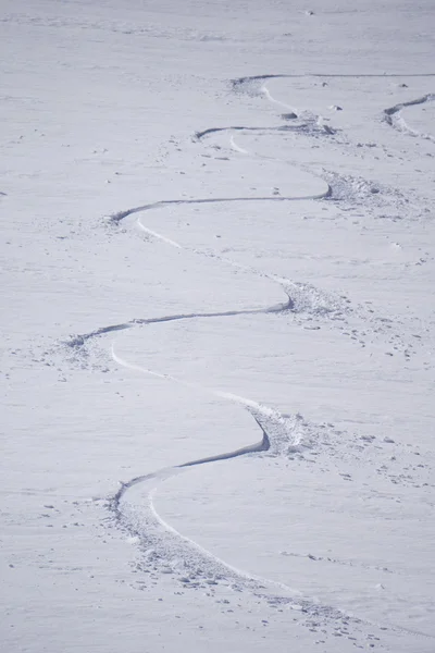 Tracks on a mountain Slope, freeride in deep snow - Stock Image ...
