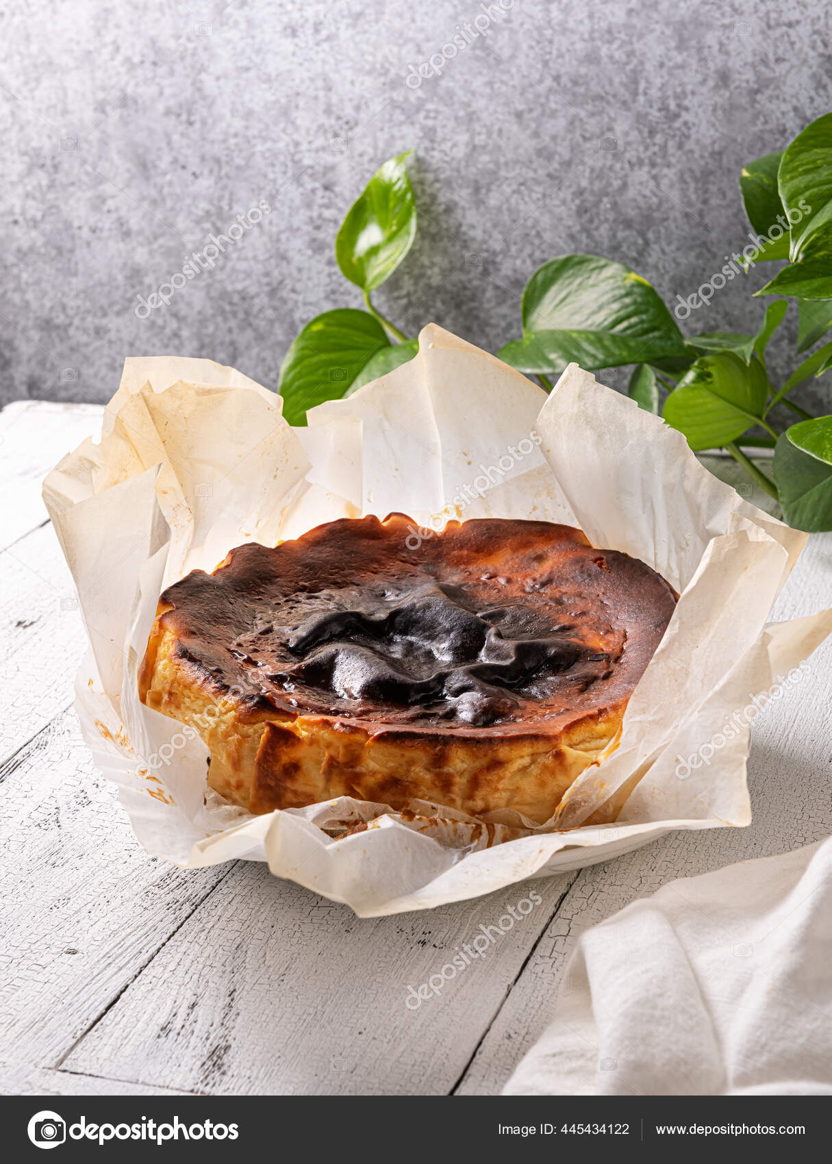 Homemade Basque Burnt Cheesecake Baking Paper Textured White Wooden ...