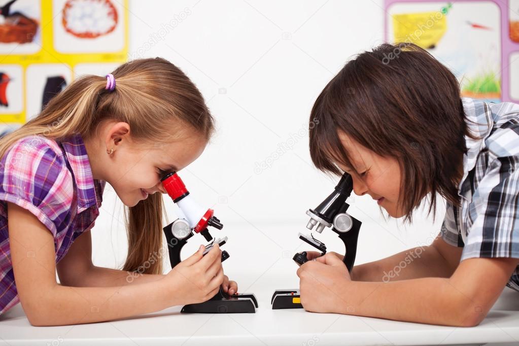 Kids in science class Stock Photo by ©ilona75 85904266