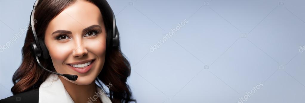 Customer support phone operator in headset, with copyspace — Stock Photo © g_studio #96392500