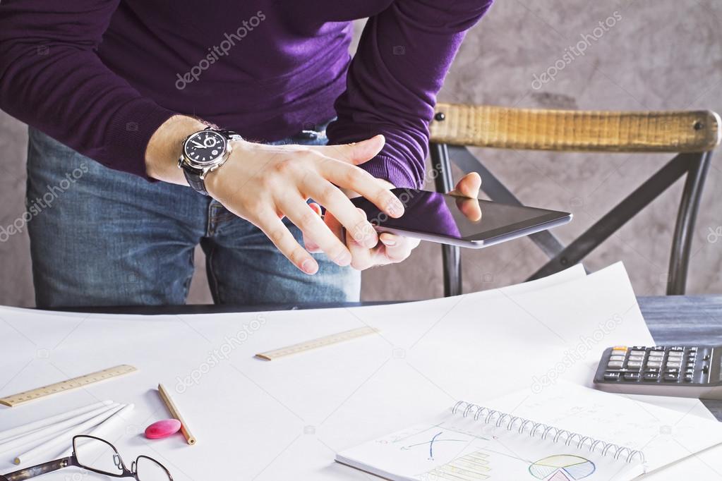 Man with tablet Stock Photo by ©peshkova 107630136