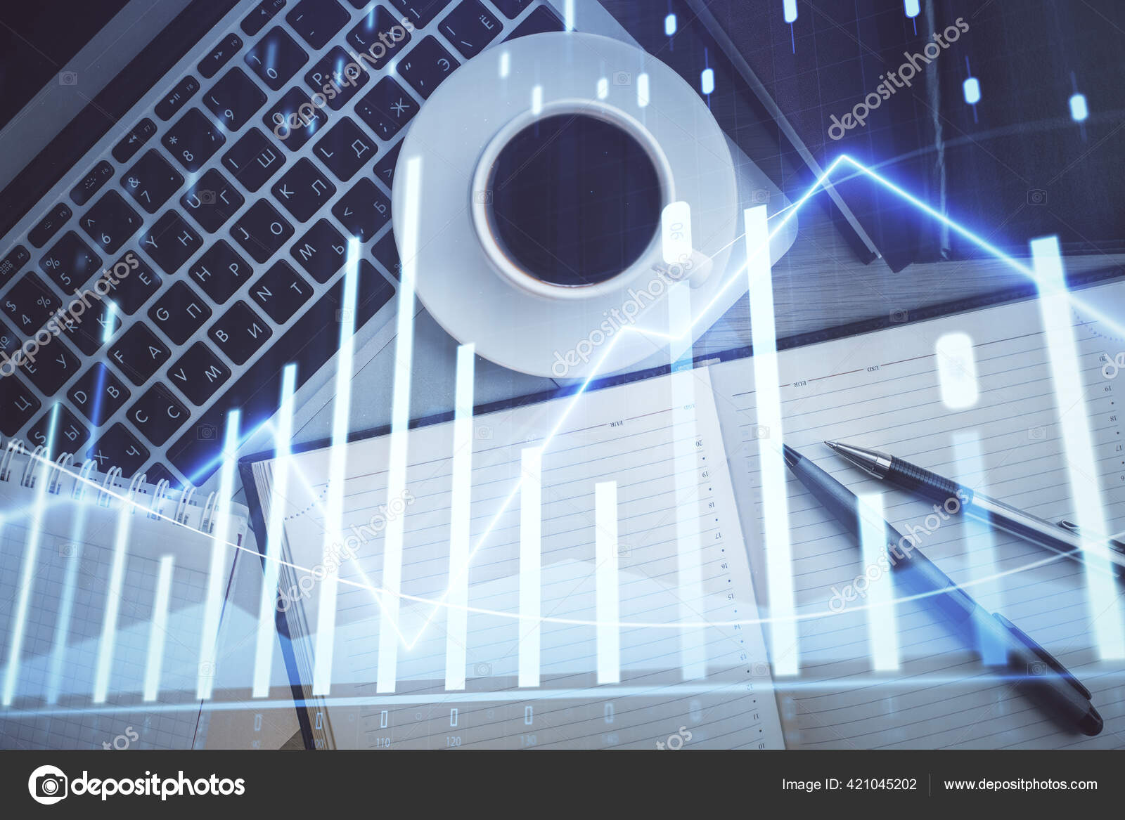 Stock market chart and top view computer on the table background ...