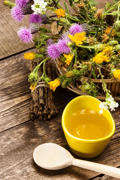 Fresh, raw honey and wild flowers - Stock Image - Everypixel