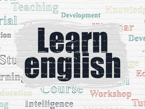 Studying concept: Learn English on wall background - Stock Image ...