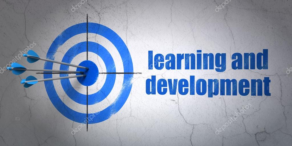 Studying concept: target and Learning And Development on wall ...