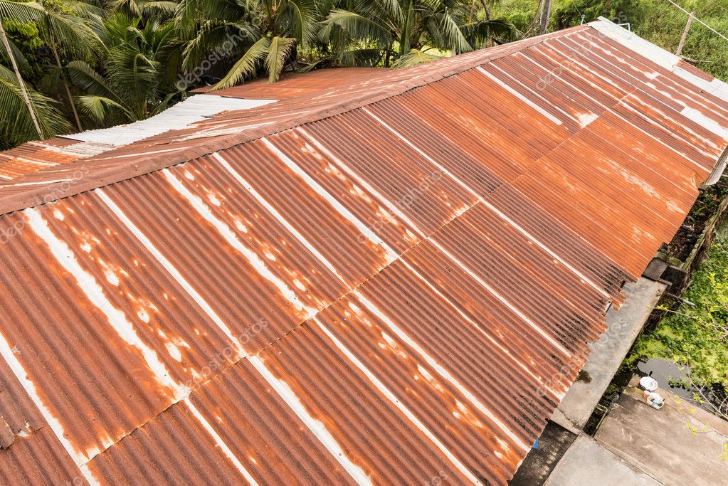 Old rusty galvanized steel of old roof — Stock Photo © wuttichok #71097631