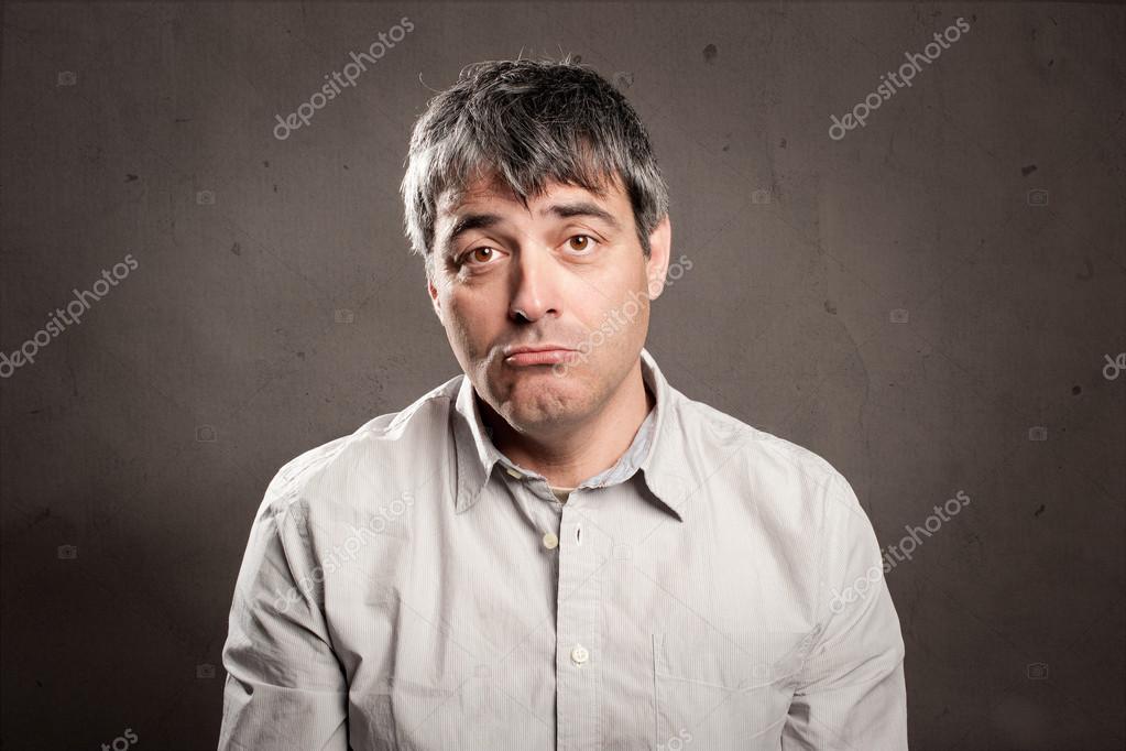 Man with sad expression Stock Photo by ©xavigm99 52336389