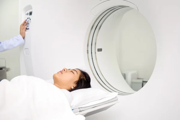 Asian lady sleep on a CT Scan - Stock Image - Everypixel