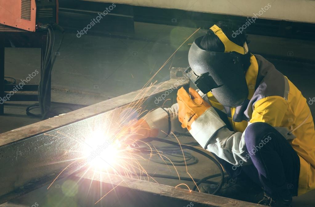 Worker work hard with welding process Stock Photo by ©anekoho 96495916