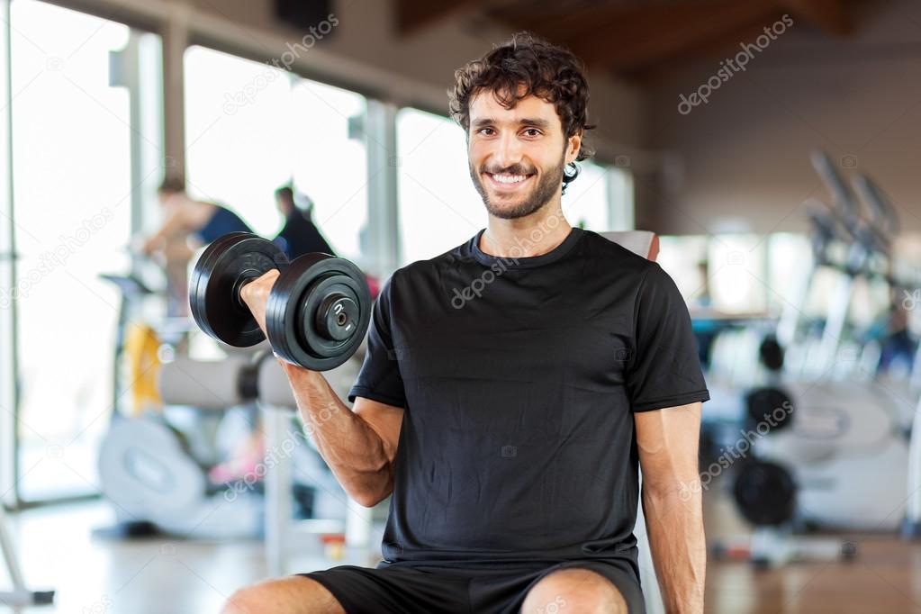Entrenamiento de hombre en gimnasio: fotografía de stock © minervastock ...