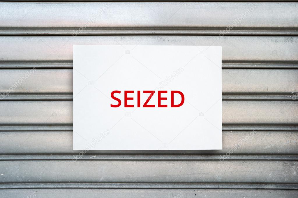 Red seized sign Stock Photo by ©minervastock 122362890