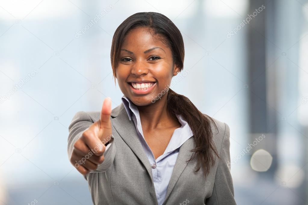Business woman giving thumbs up Stock Photo by ©minervastock 54349829 Business woman giving thumbs up Stock Photo by ©minervastock 54349829