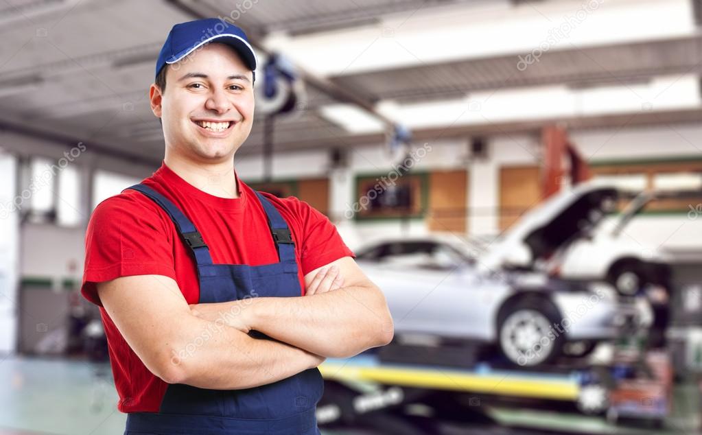 Friendly smiling mechanic — Stock Photo © minervastock #54353081