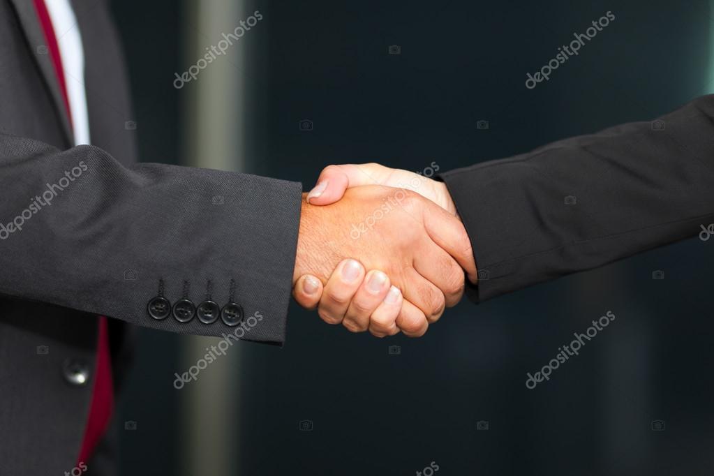 Business people handshake Stock Photo by ©minervastock 55479709