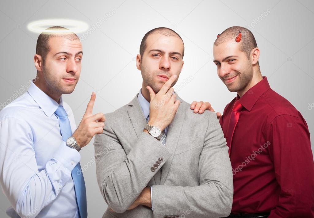Man listening good and evil self — Stock Photo © minervastock #58797803