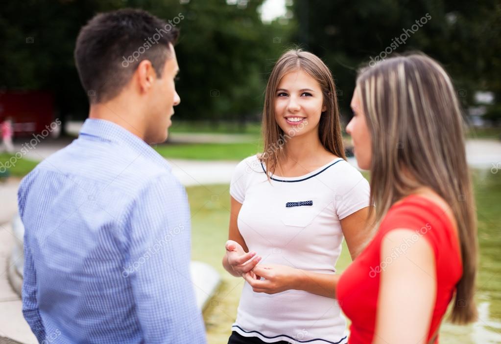 Amigos hablando en el parque: fotografía de stock © minervastock ...