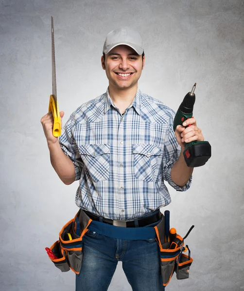 Handyman with tools Stock Photo by ©Goir 104339600