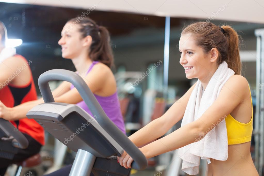 People doing indoor biking Stock Photo by ©minervastock 68240079