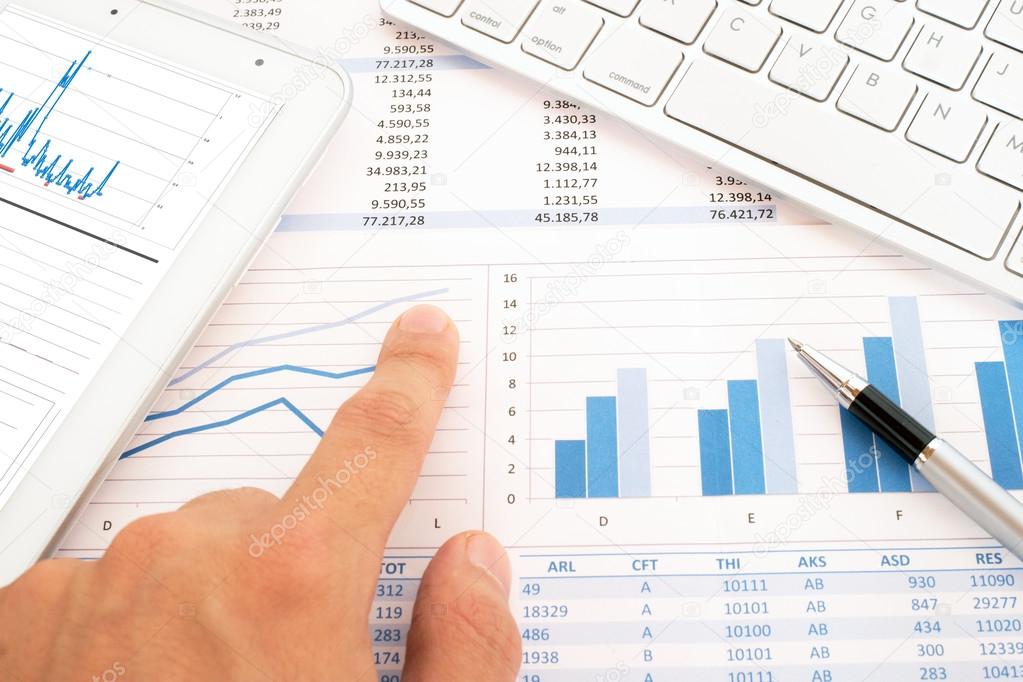 Hand and financial documents — Stock Photo © minervastock #75999125