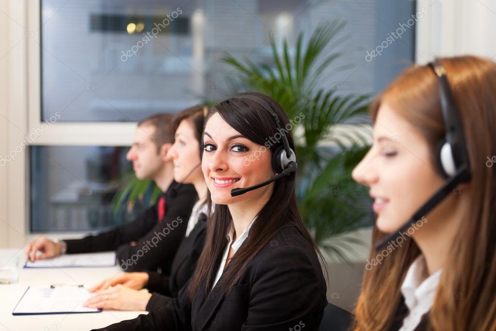Smiling customer representatives — Stock Photo © minervastock #82309918
