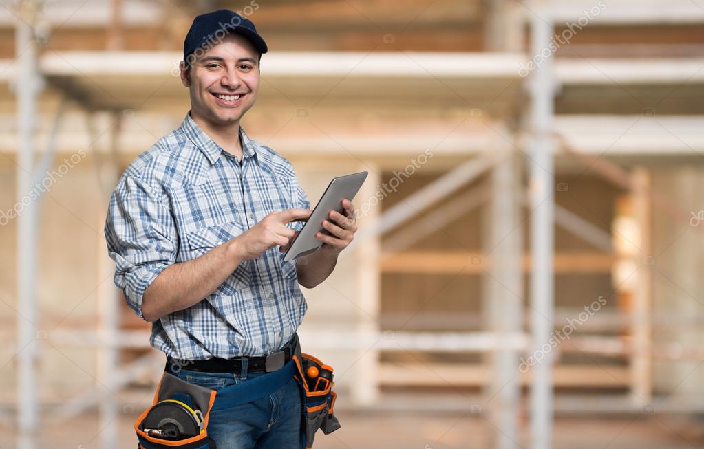Artisan using his tablet computer — Stock Photo © minervastock #87186346