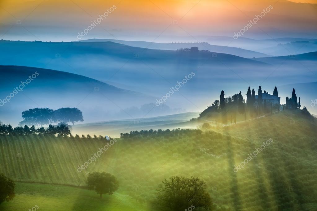 Sunrise over the green fields in Tuscany – Stock Editorial Photo ...