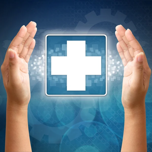 Woman hand pushing First aid icon on touch screen interface - Stock ...
