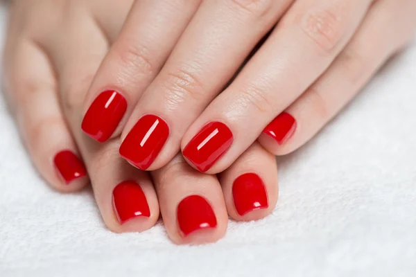 woman's hands with red nail polish - Stock Image - Everypixel