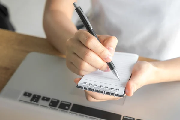 Hand with silver pen — Stock Photo © jannystockphoto #85602240