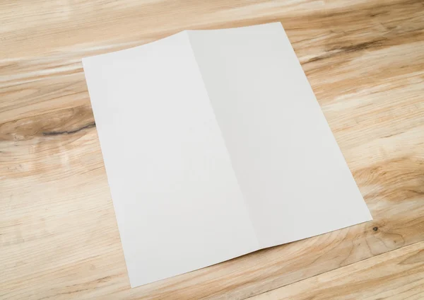 Blank white folding paper flyer Stock Photo by ©fontgraf 49783445