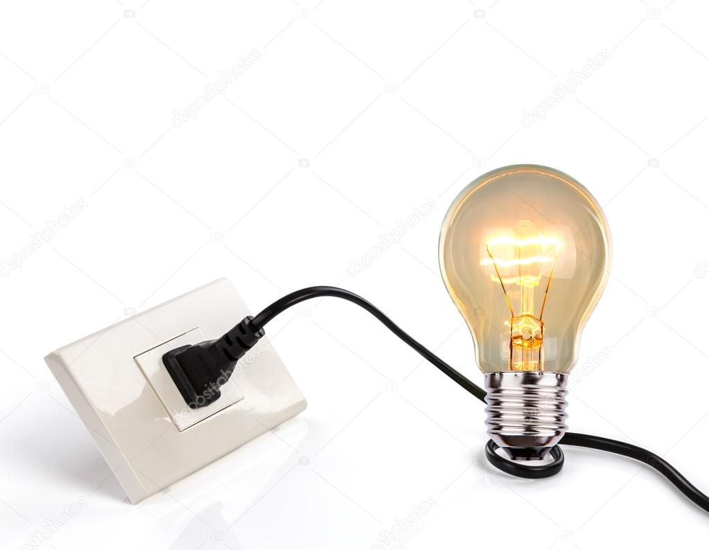 Light bulb and a plug with a cord Stock Photo by ©jannystockphoto 66080341