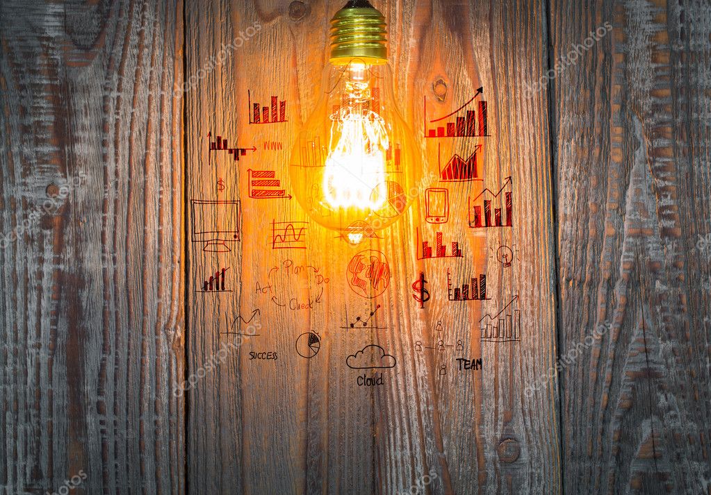 Glowing bulb with drawing graph on the wood background Stock Photo by ...