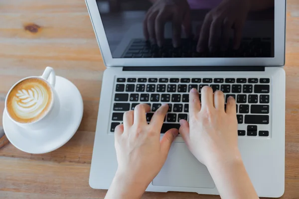 Woman typing on laptop keyboard - Stock Image - Everypixel