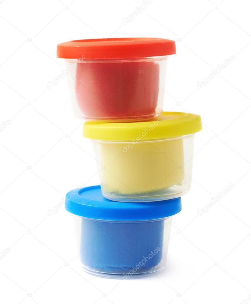 Pile of modeling clay boxes isolated Stock Photo by ©nbvf89 96773500
