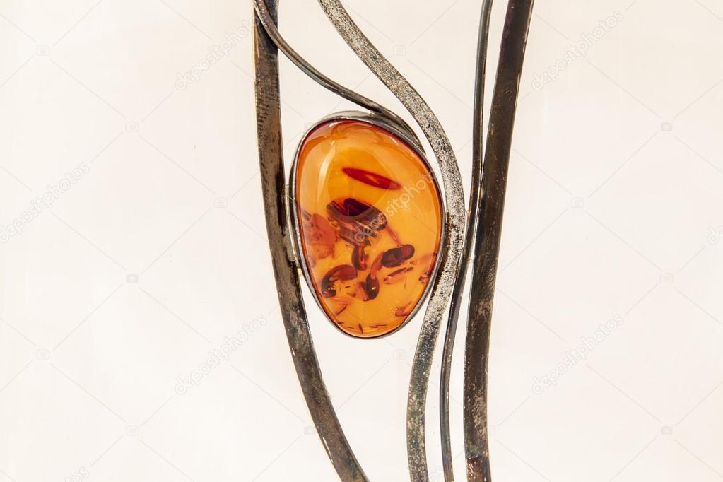Insects embedded in amber - jewelry Stock Photo by ©piotrek.zel 63754007