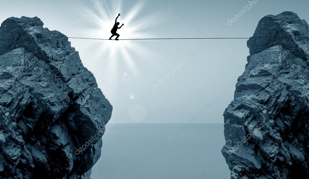 Man Balancing on the Rope High in the Sky Stock Photo by ©bolina 77605920