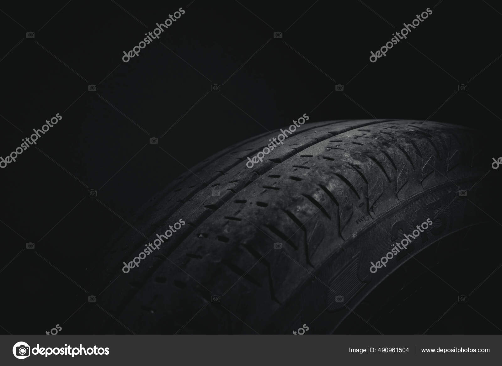 Tire from a car type truck on a black and white background with a ...