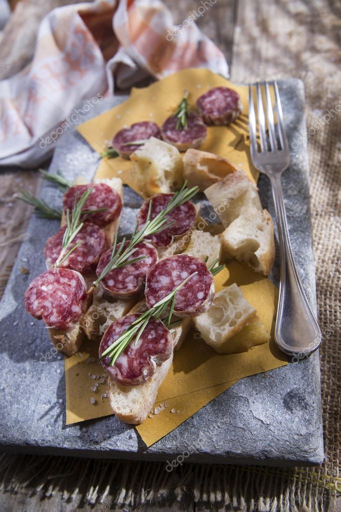 Focaccia and salami — Stock Photo © Fotografiche #51993301