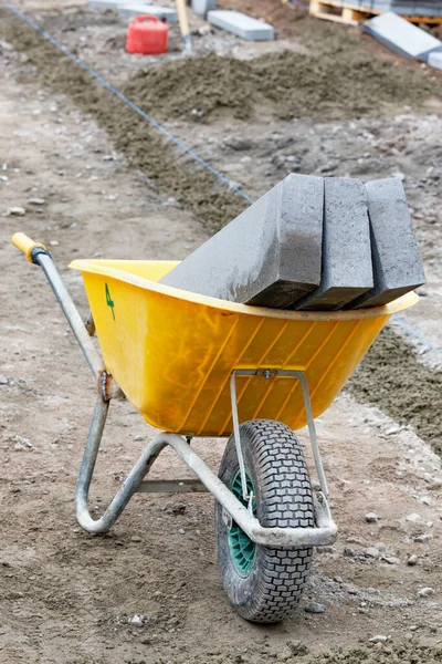 Wheelbarrow concrete Stock Photos, Royalty Free Wheelbarrow concrete ...