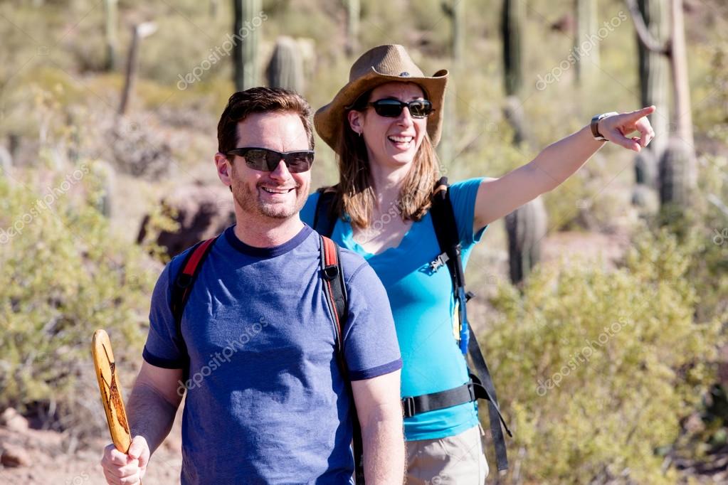 Desert Hiker Pointing with Friend — Stock Photo © creatista #108681718