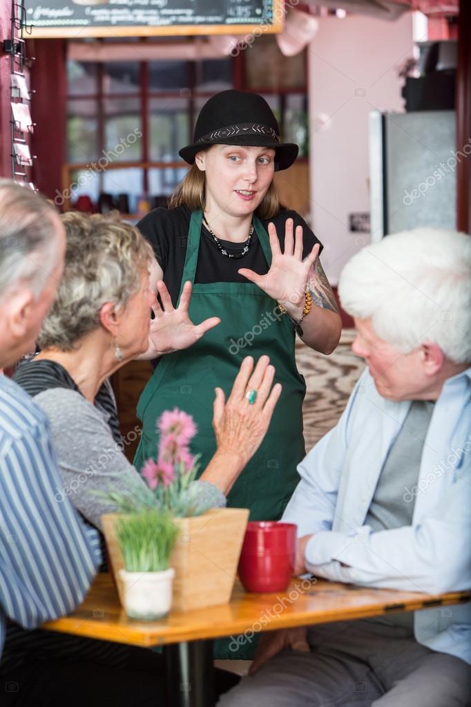 Angry Customers and defensive worker — Stock Photo © creatista #110927588