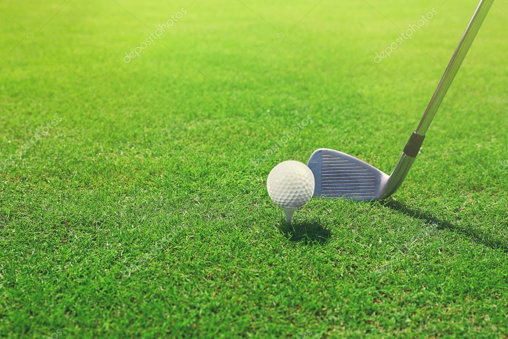 Golf club and ball — Stock Photo © belchonock #100787800