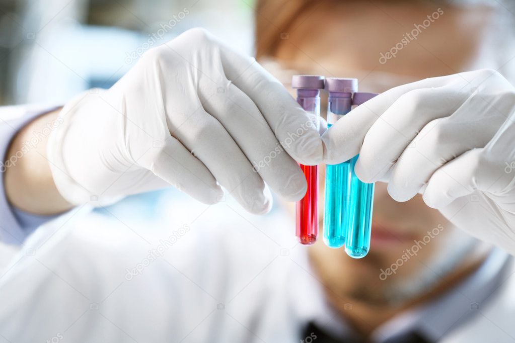 Man in laboratory with test Stock Photo by ©belchonock 100925008